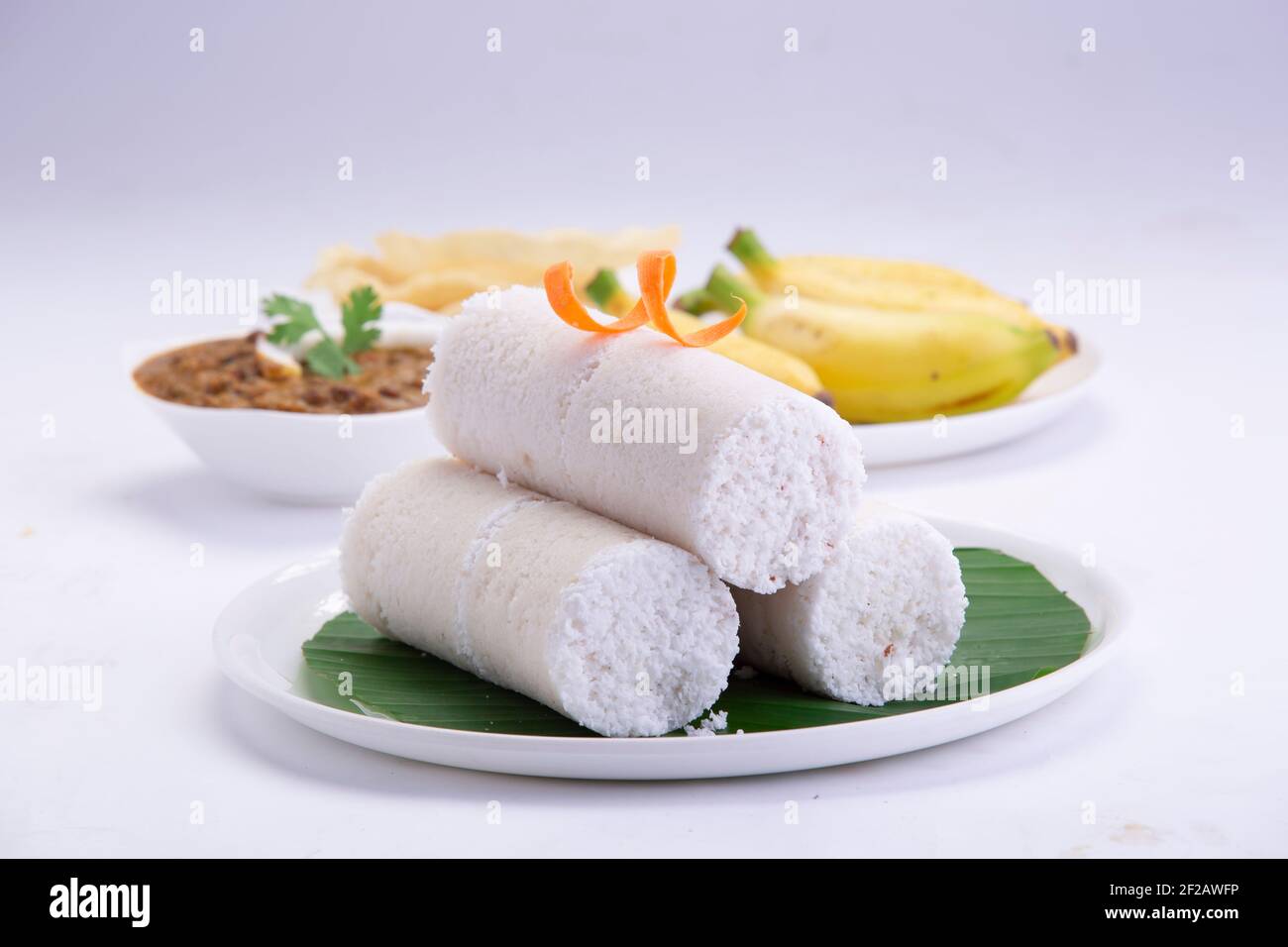 Puttu, steam cake ,white raw rice puttu , pacharisi maavu puttu with ...