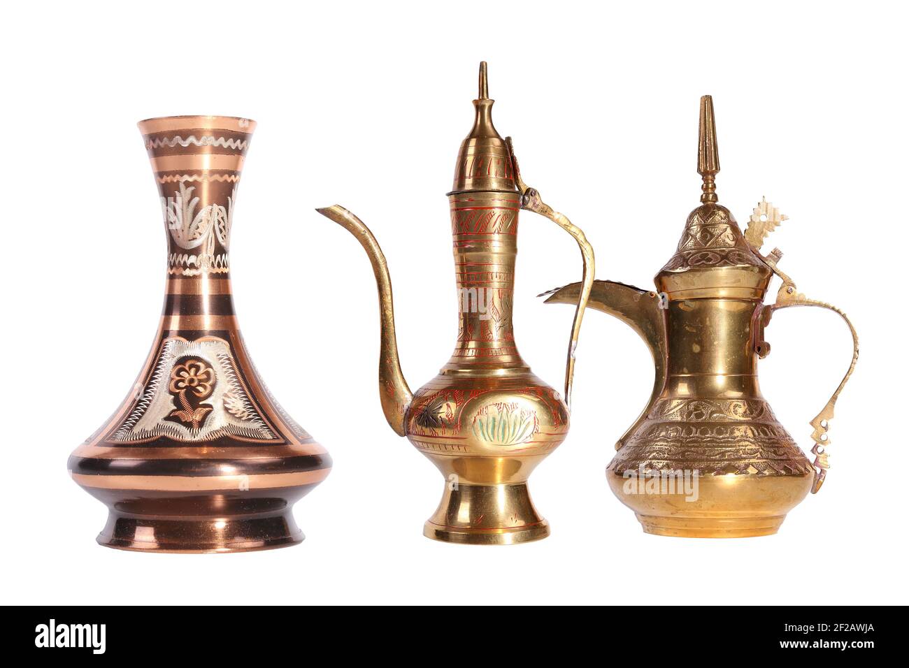 Copper jug with a traditional Arabic ornaments on a white background ...