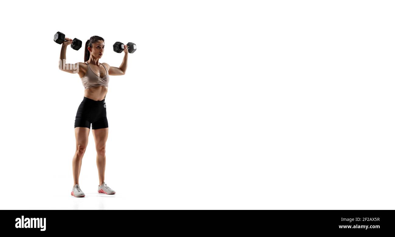 Strong, powerful. Flyer. Caucasian professional female athlete training ...