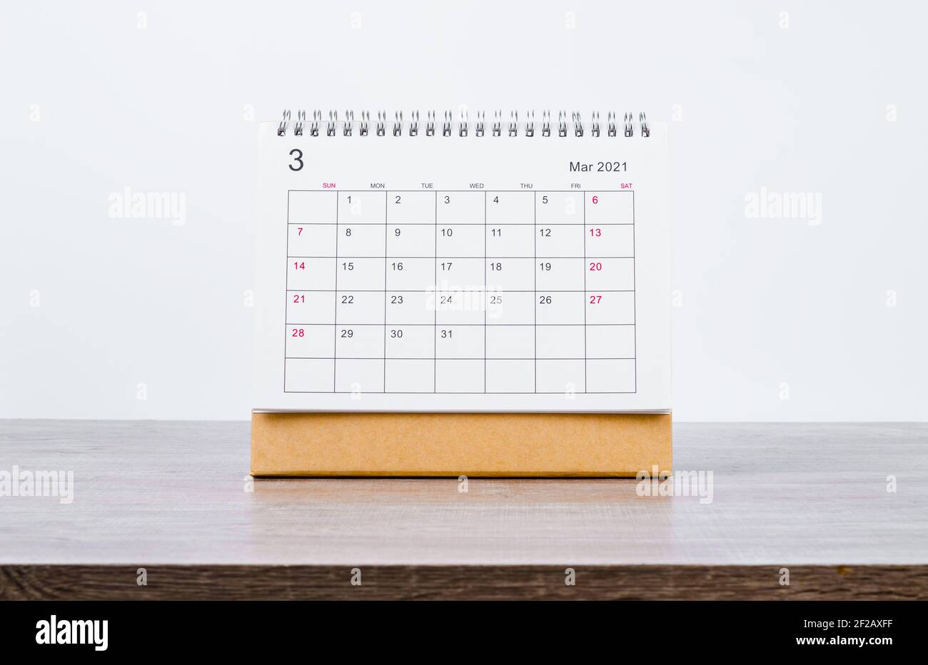 March Calendar 2021 on wooden table background Stock Photo - Alamy