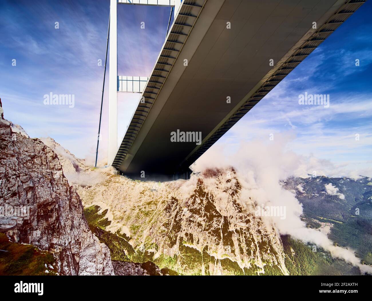 Bridge in the sun, composite photo of the Alps in Bavaria with a bridge ...