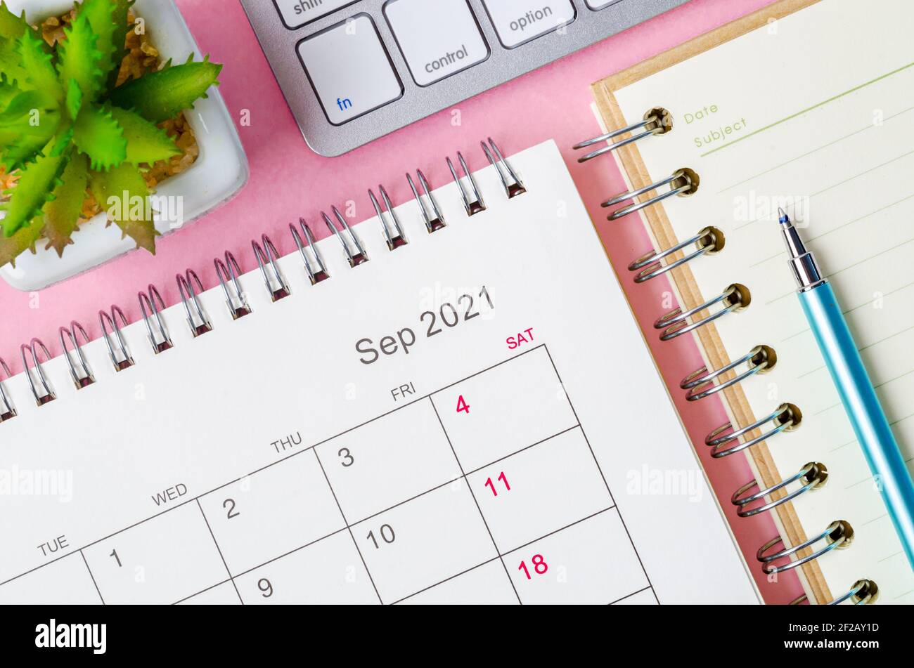 September 2021 calendar with note book on pink background Stock Photo ...
