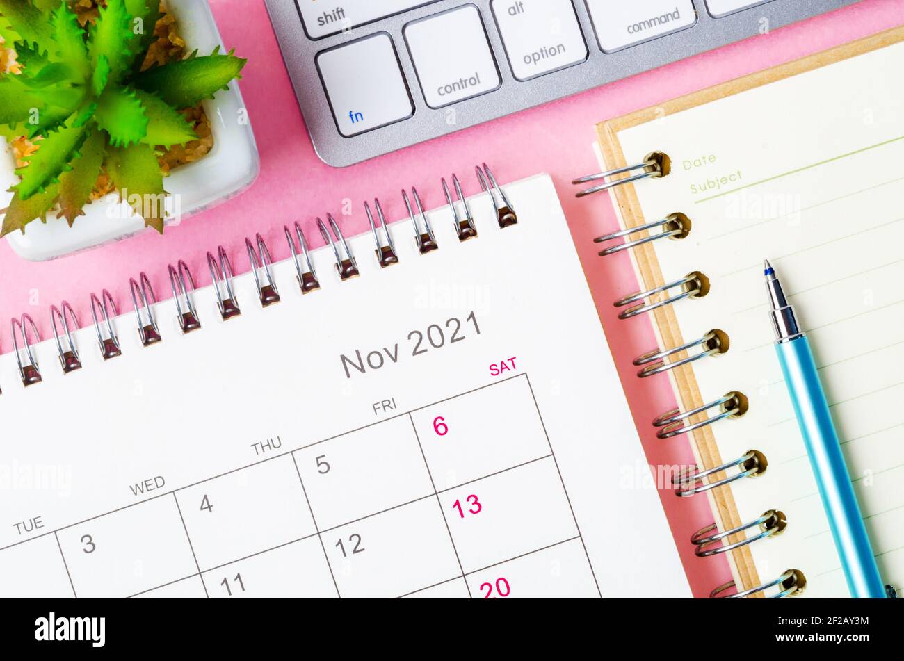 November 2021 calendar with note book on pink background Stock Photo ...