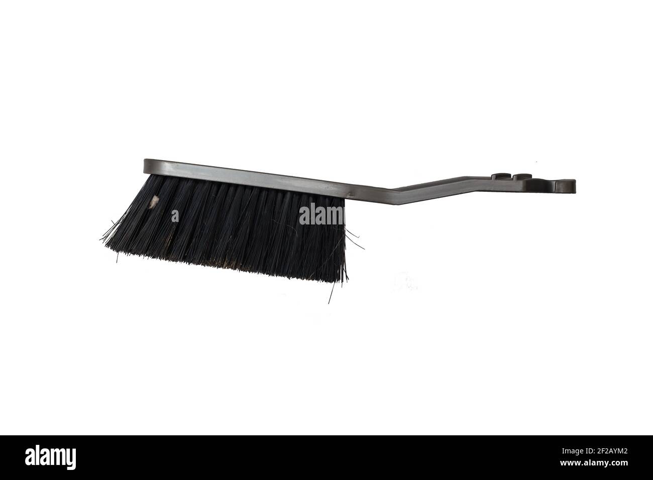 brush with black bristles on a white background,wooden brush with ...