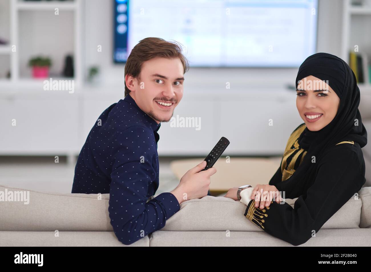 Young muslim couple enjoing time together at home during Ramadan Stock ...