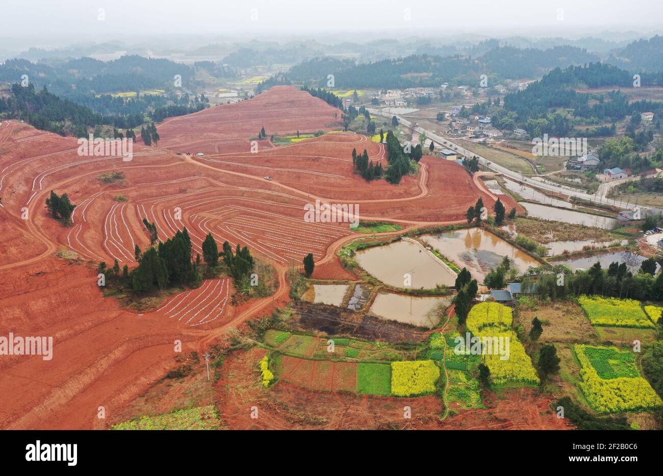 Tongnan. 10th Mar, 2021. Aerial photo shows Guandian Village in ...