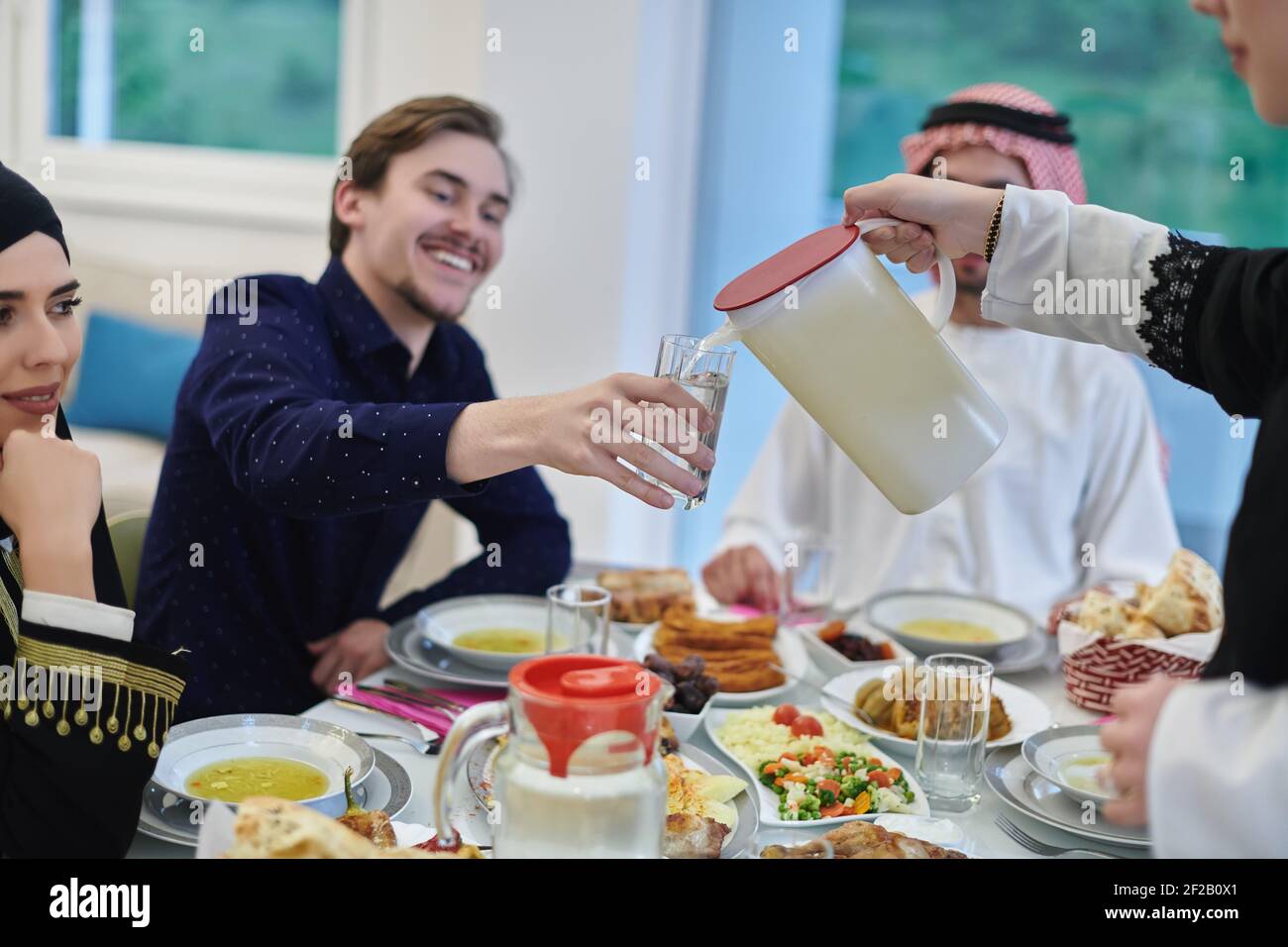Muslim family having iftar together during Ramadan Stock Photo - Alamy