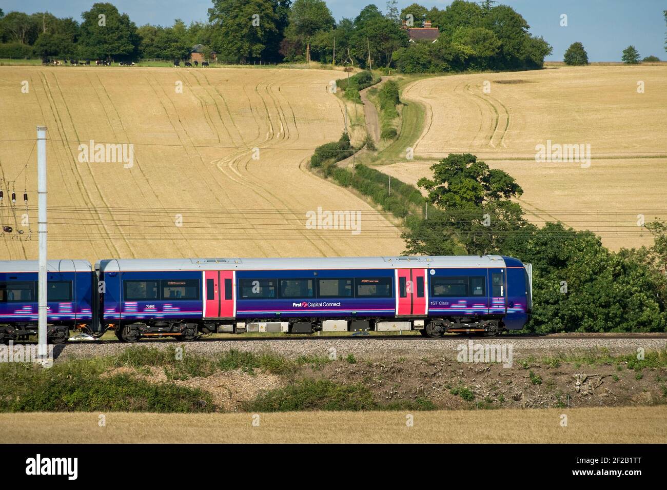 Class 377 passenger train in First Capital Connect livery speeding ...