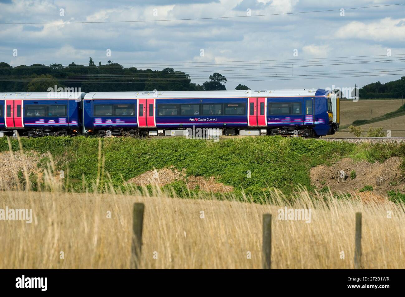 Class 377 passenger train in First Capital Connect livery speeding ...