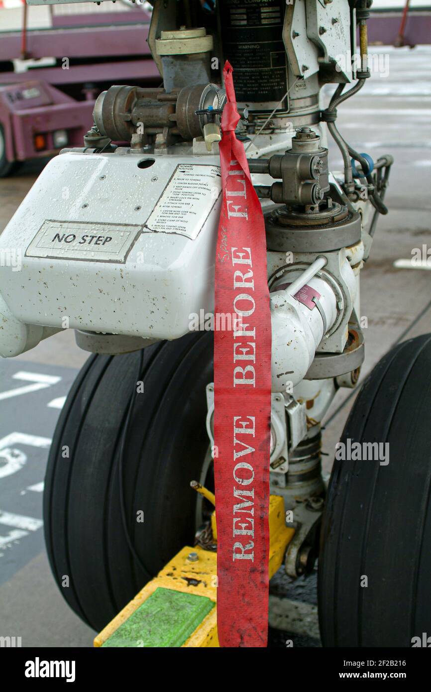 Safety warning sign on the nose landing gear of an Uzbekistan Airways ...