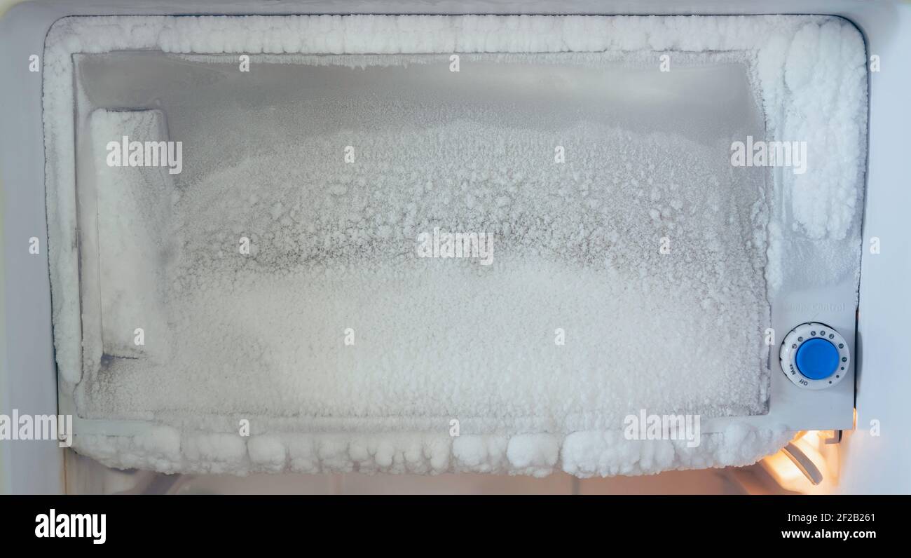 freezer of a refrigerator. Ice buildup inside of a freezer walls Stock ...