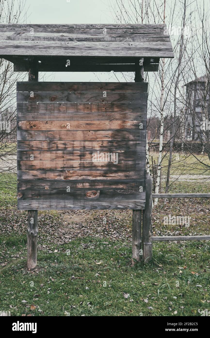 Wooden old stand with a visor for hanging ads, copy space Stock Photo ...
