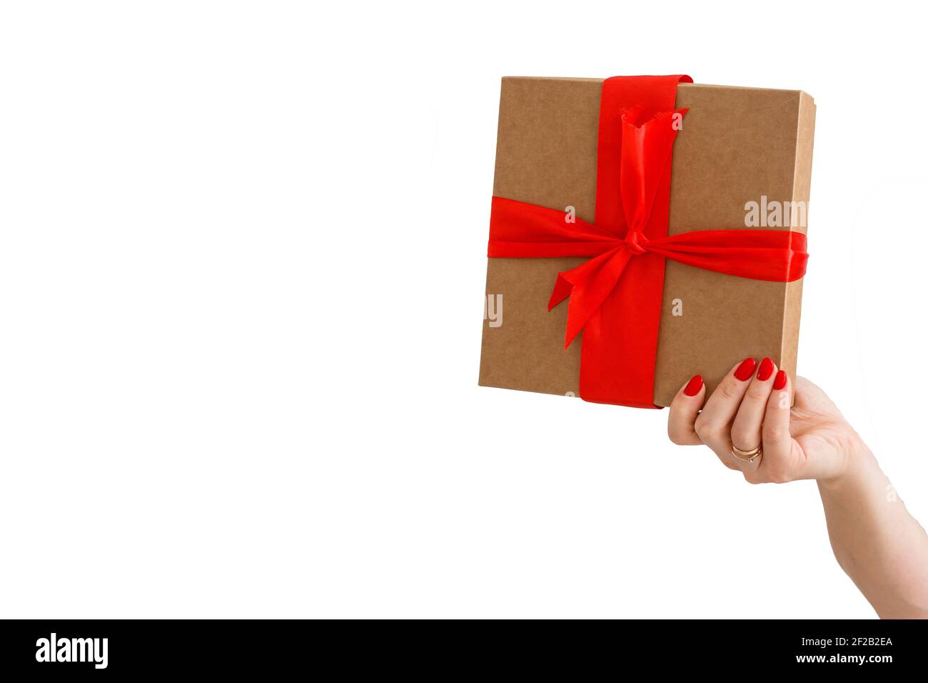 Wrapped vintage gift box with red ribbon bow, isolated on white Stock ...