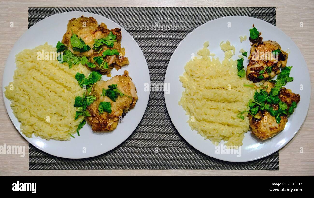 Pasta Orzo with meat for two people. Fried chicken with macaroni. Rice ...