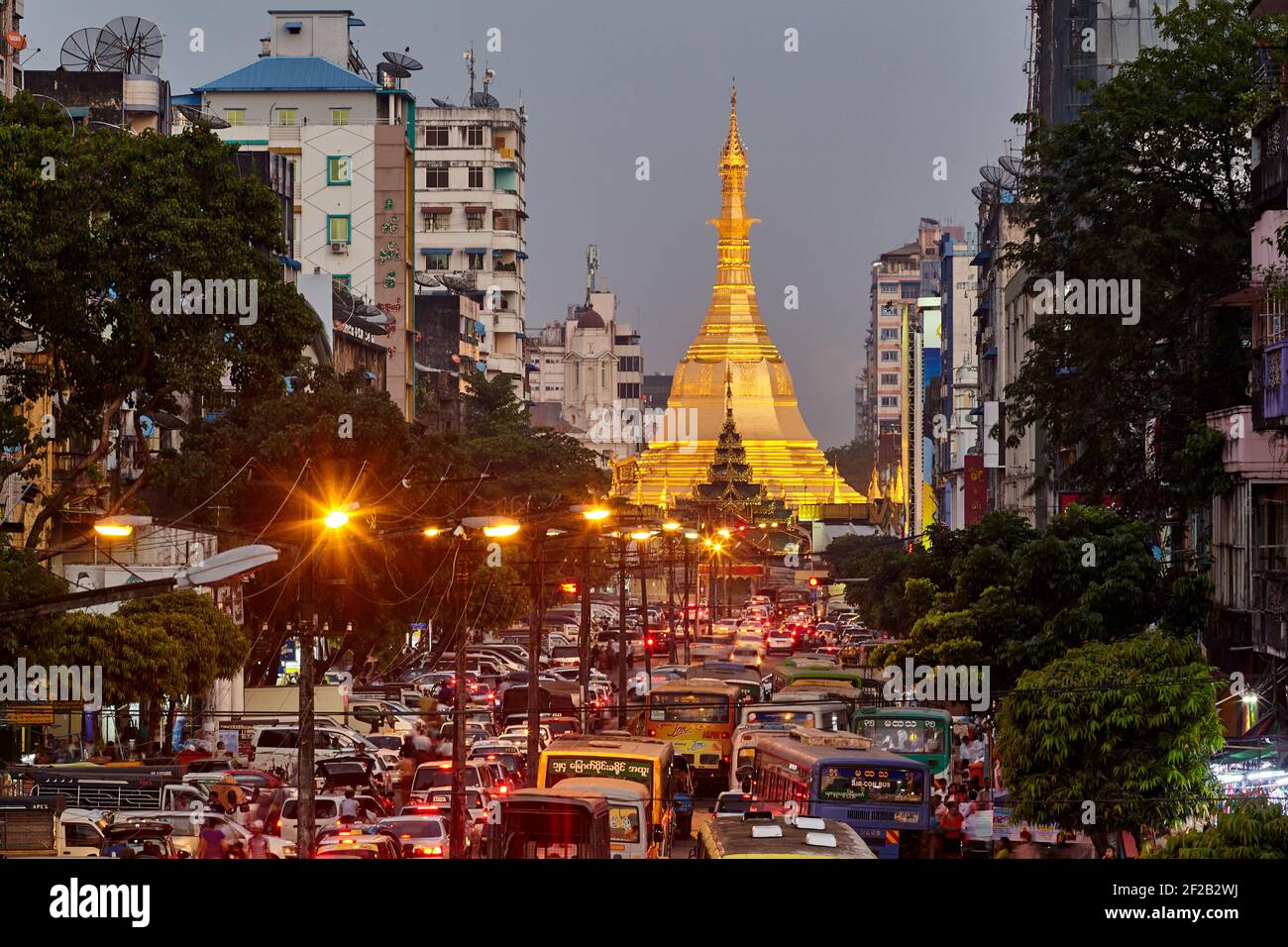 Maha Bandula Road and Sule Pagoda at night, Yangon, Myanmar. Legend ...