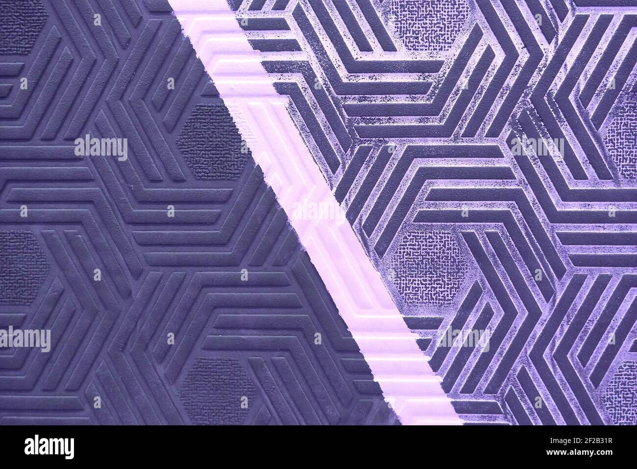 Wall background with a pattern of blue hexagonal geometric shapes ...
