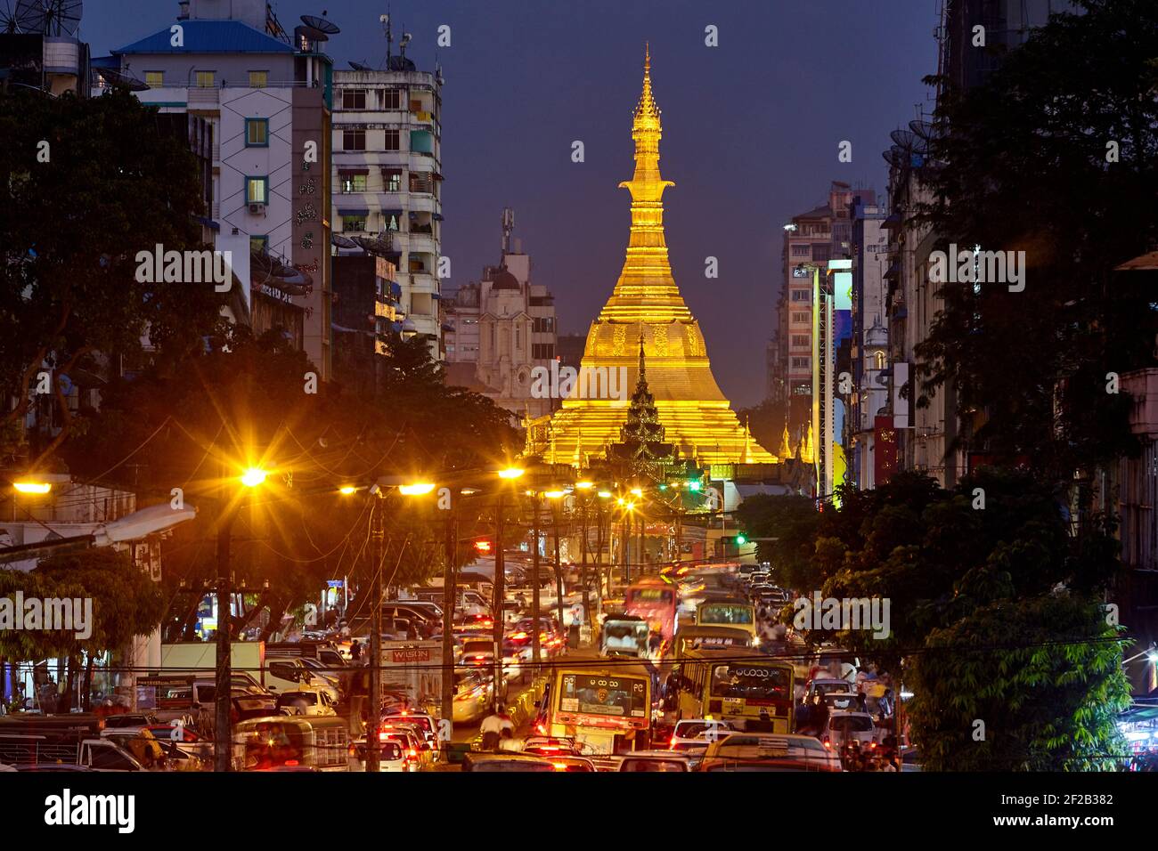Maha Bandula Road and Sule Pagoda at night, Yangon, Myanmar. Legend ...