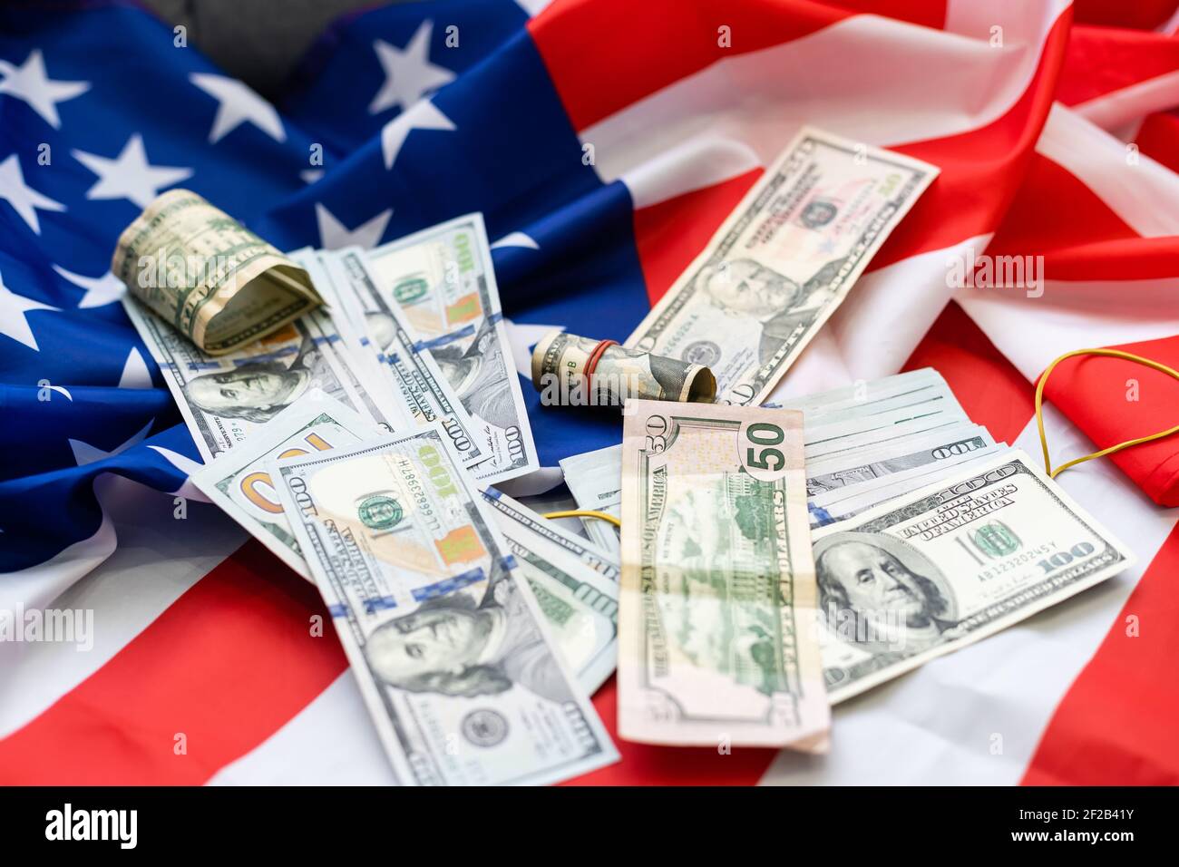 American flag on assorted banknotes, dollars Stock Photo - Alamy