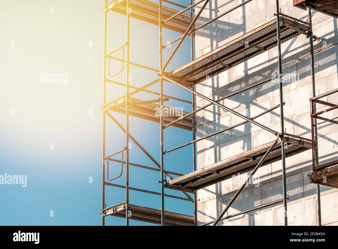 Scaffolding on multi storey building facade during facade renovation ...