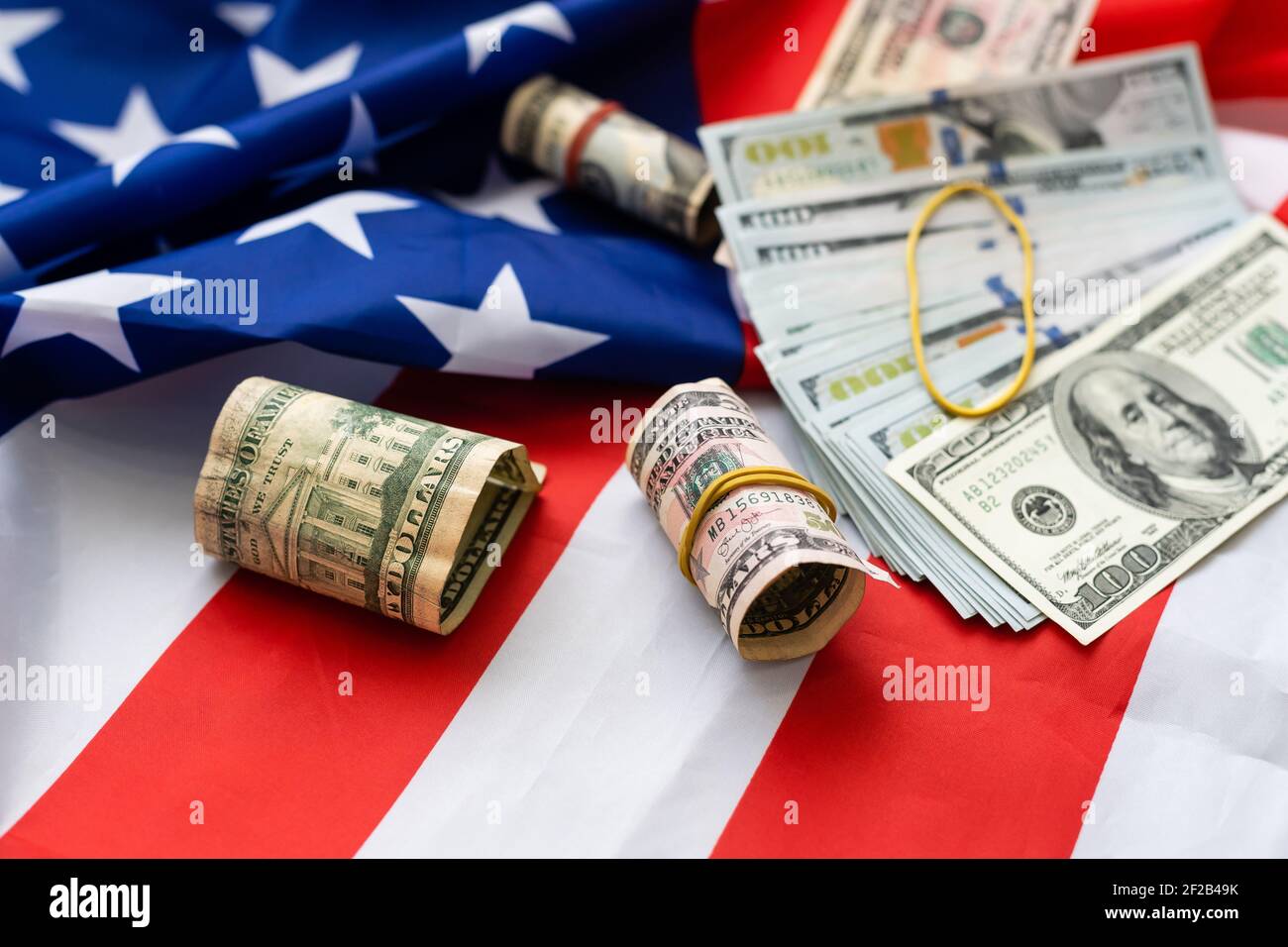 American flag on assorted banknotes, dollars Stock Photo - Alamy