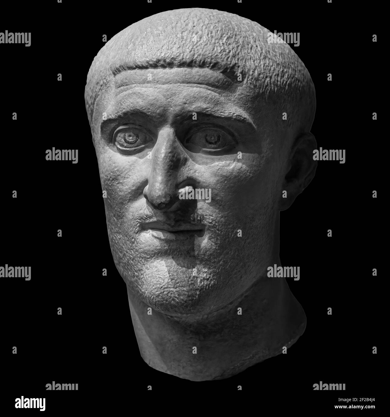 Head detail of the ancient man sculpture. Stone face isolated on black ...