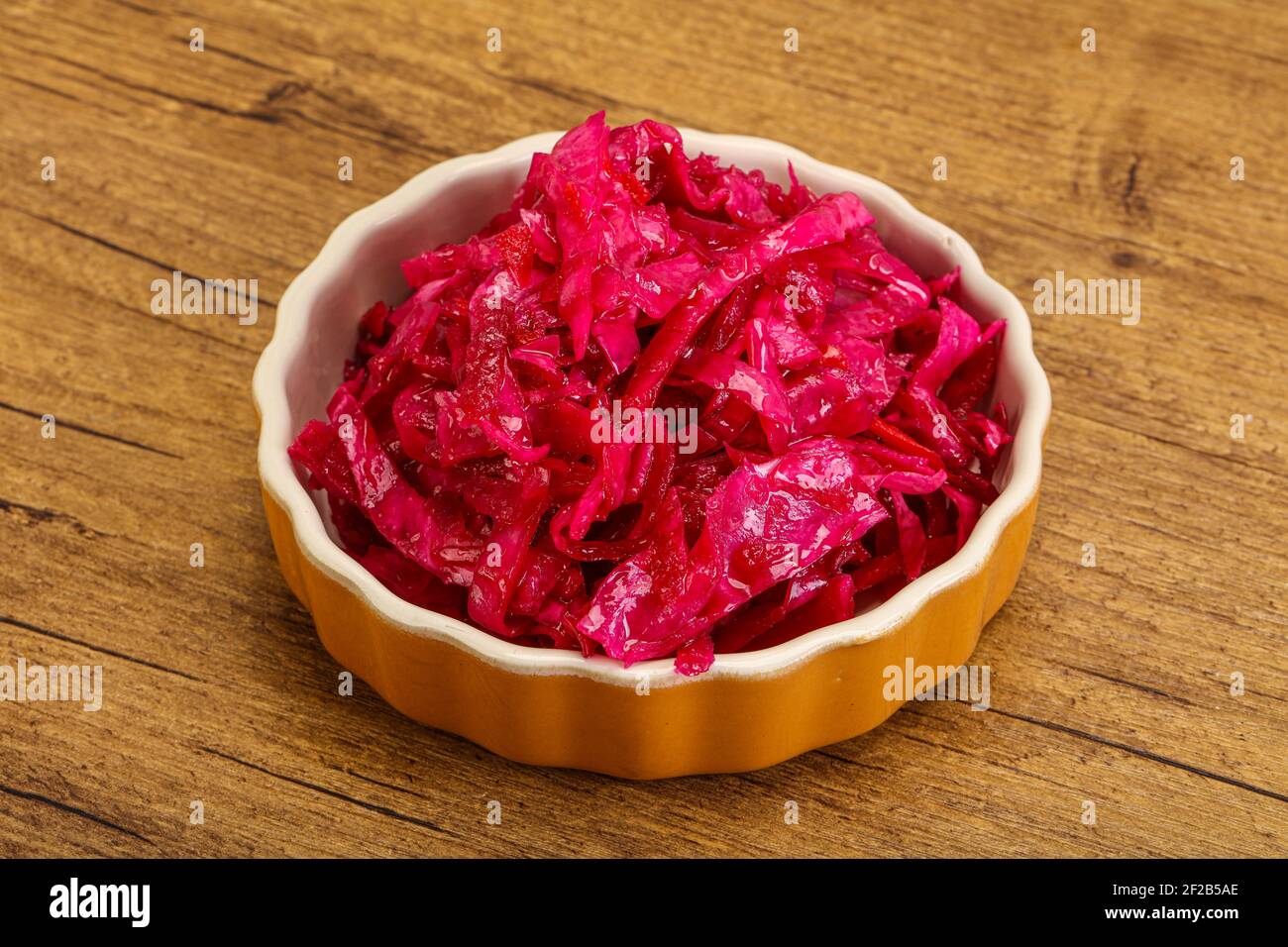 Marinated red cabbage with beetroot in the bowl Stock Photo - Alamy