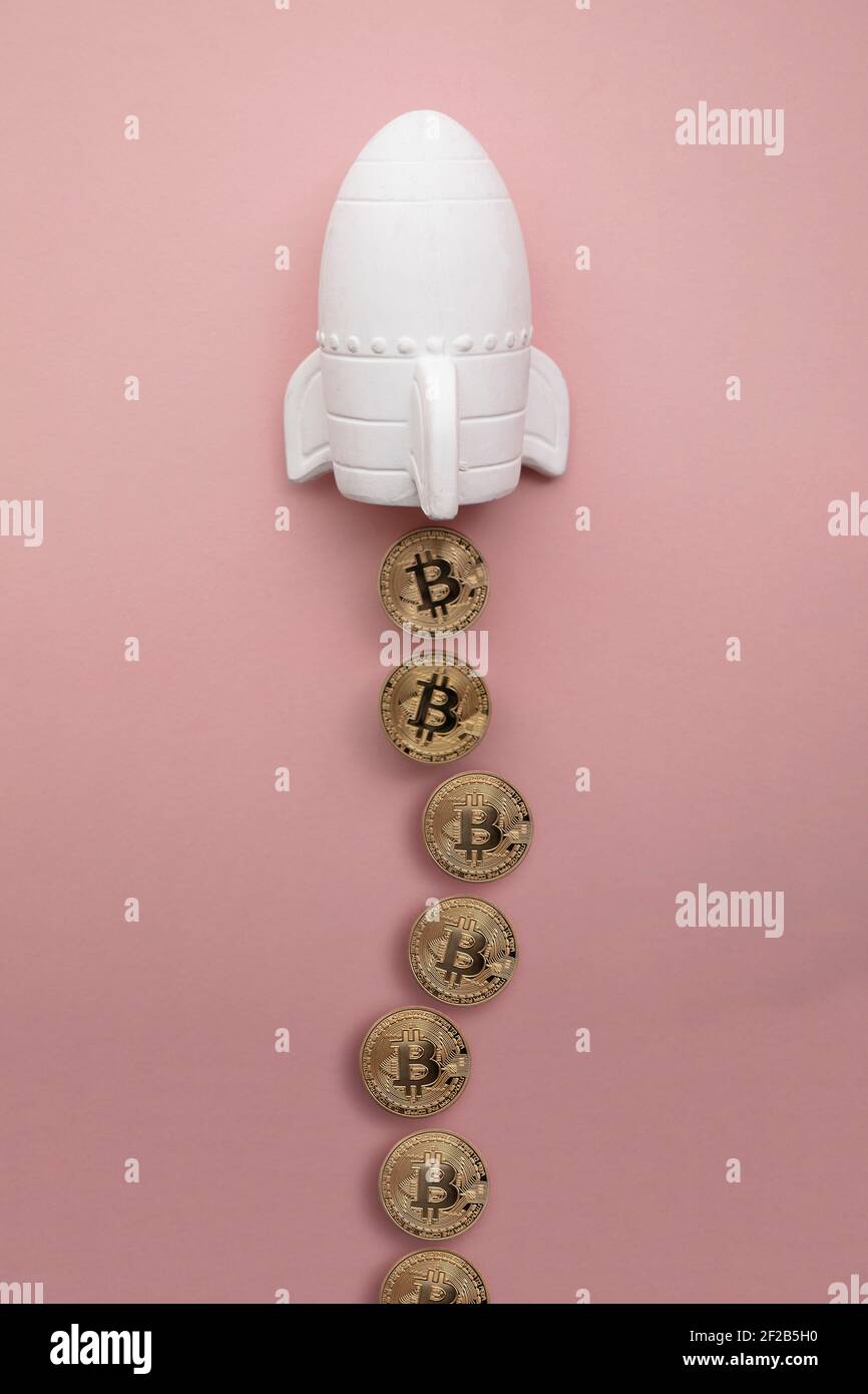 Coin rocket hi-res stock photography and images - Alamy