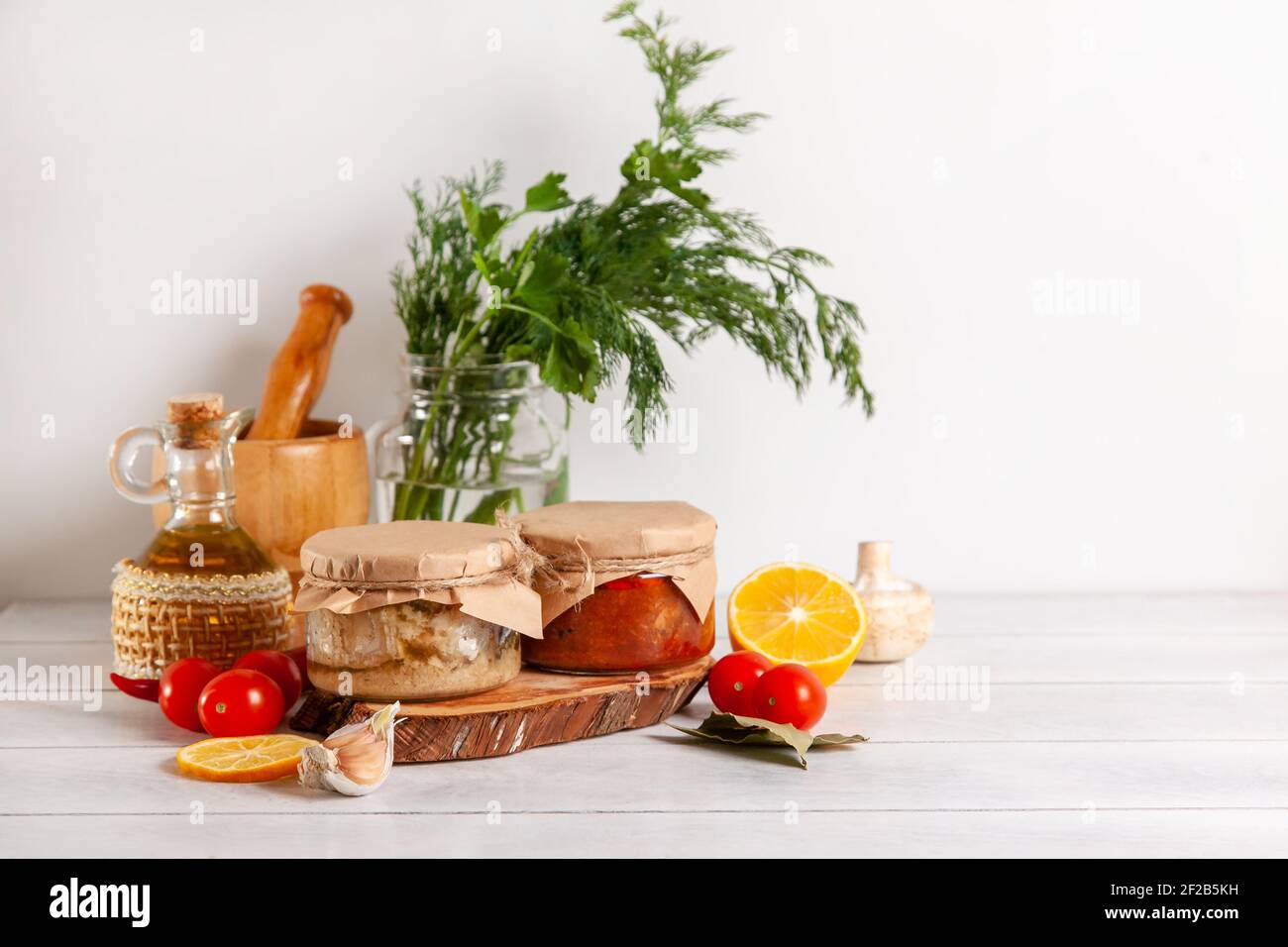 Homemade canned fish from mackerel in oil and tomato paste. Glass jars ...