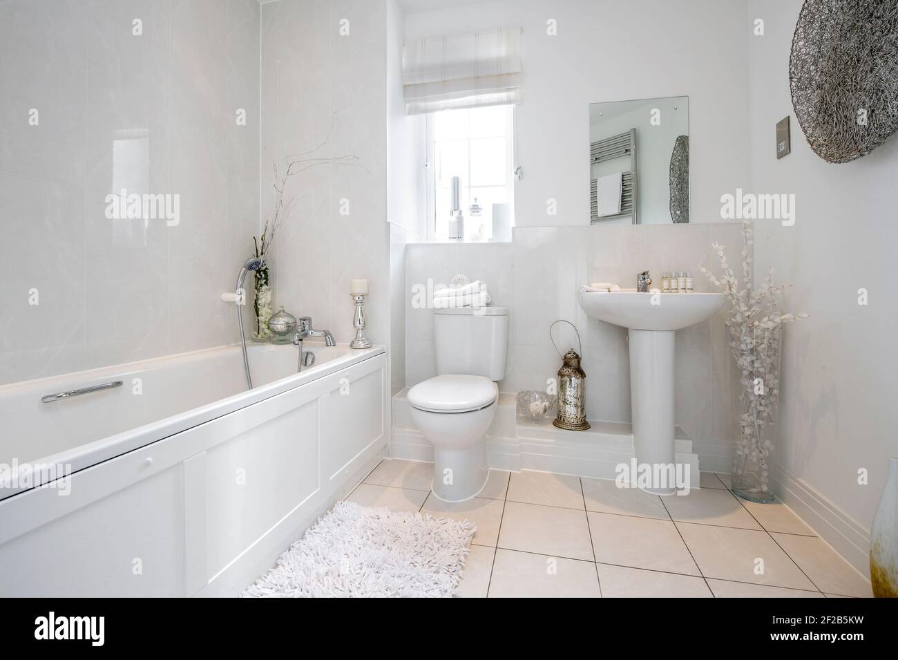 Clean white bathroom in a brand new house Stock Photo - Alamy