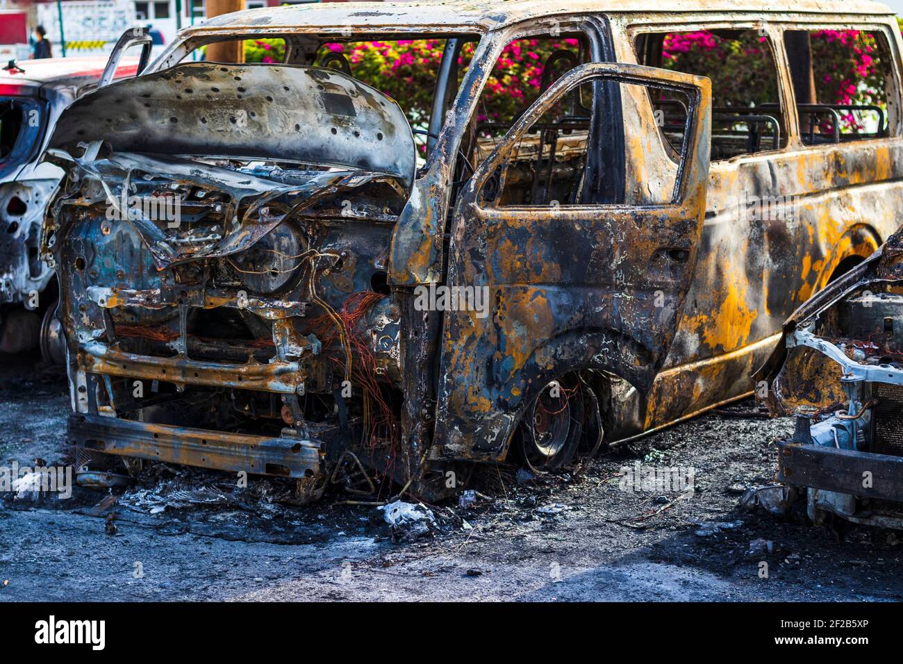 Remains of a van destroyed by fire Stock Photo - Alamy