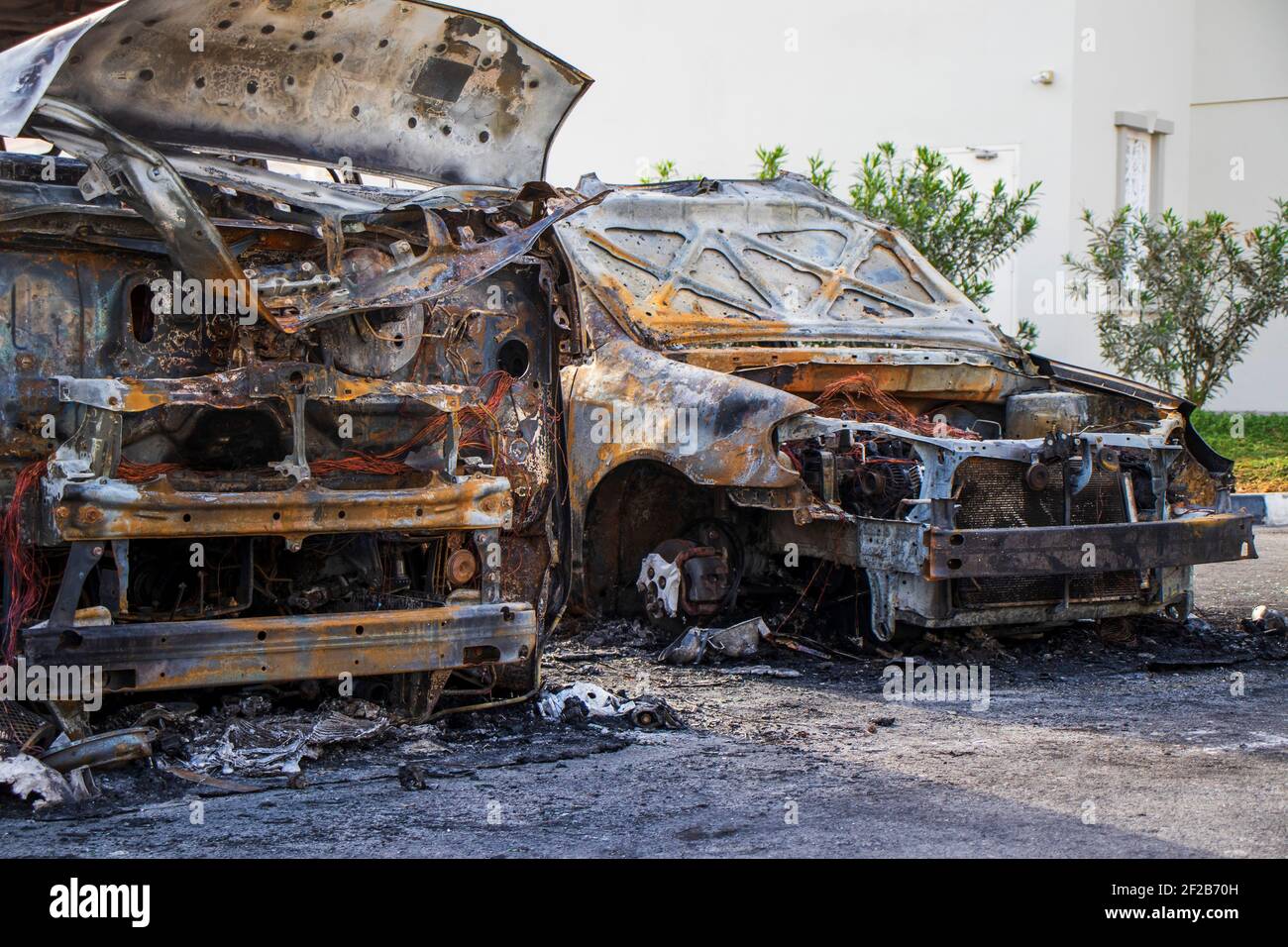 Remains of a car and van destroyed by fire Stock Photo - Alamy