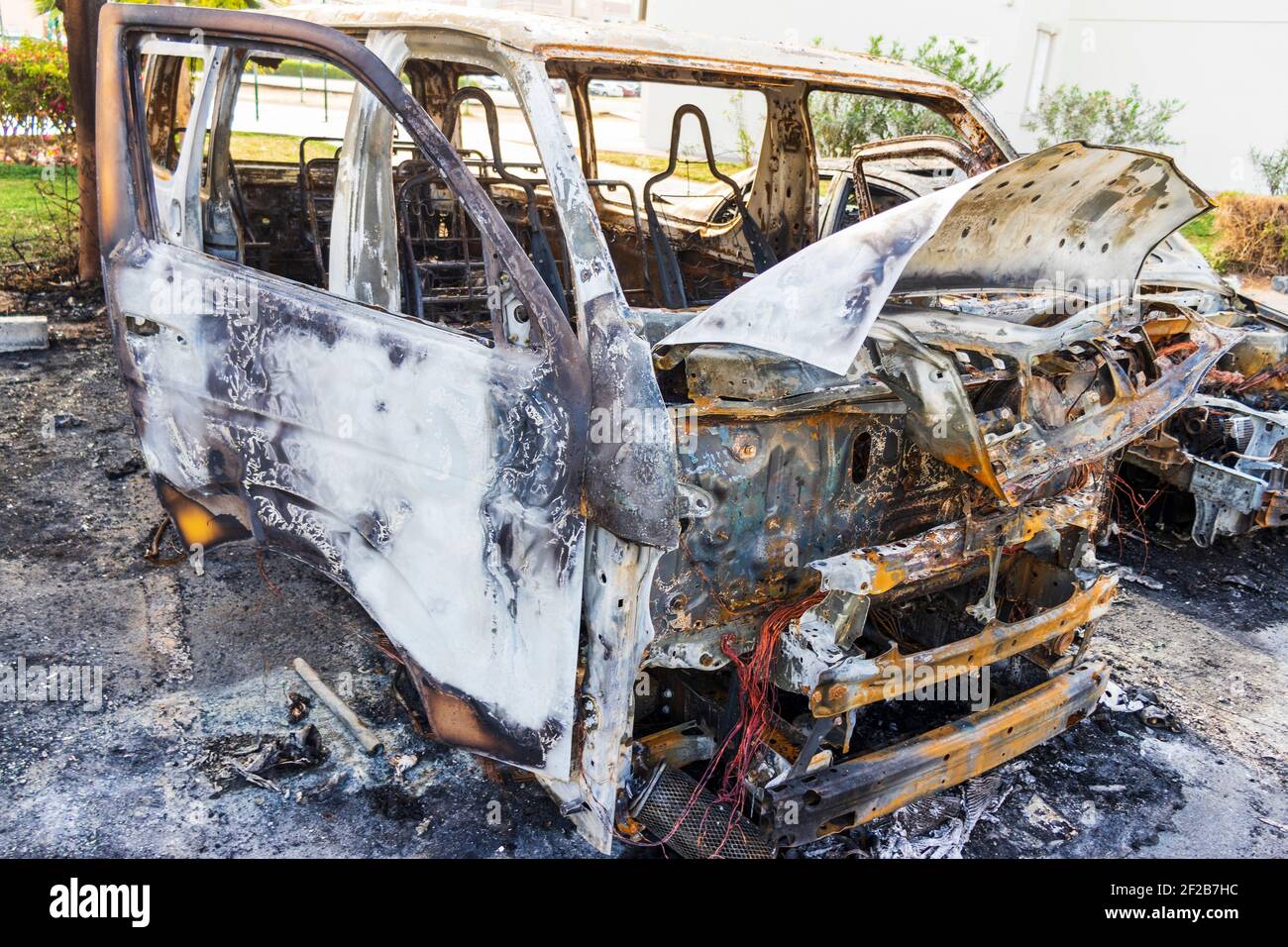 Remains of a van destroyed by fire Stock Photo - Alamy