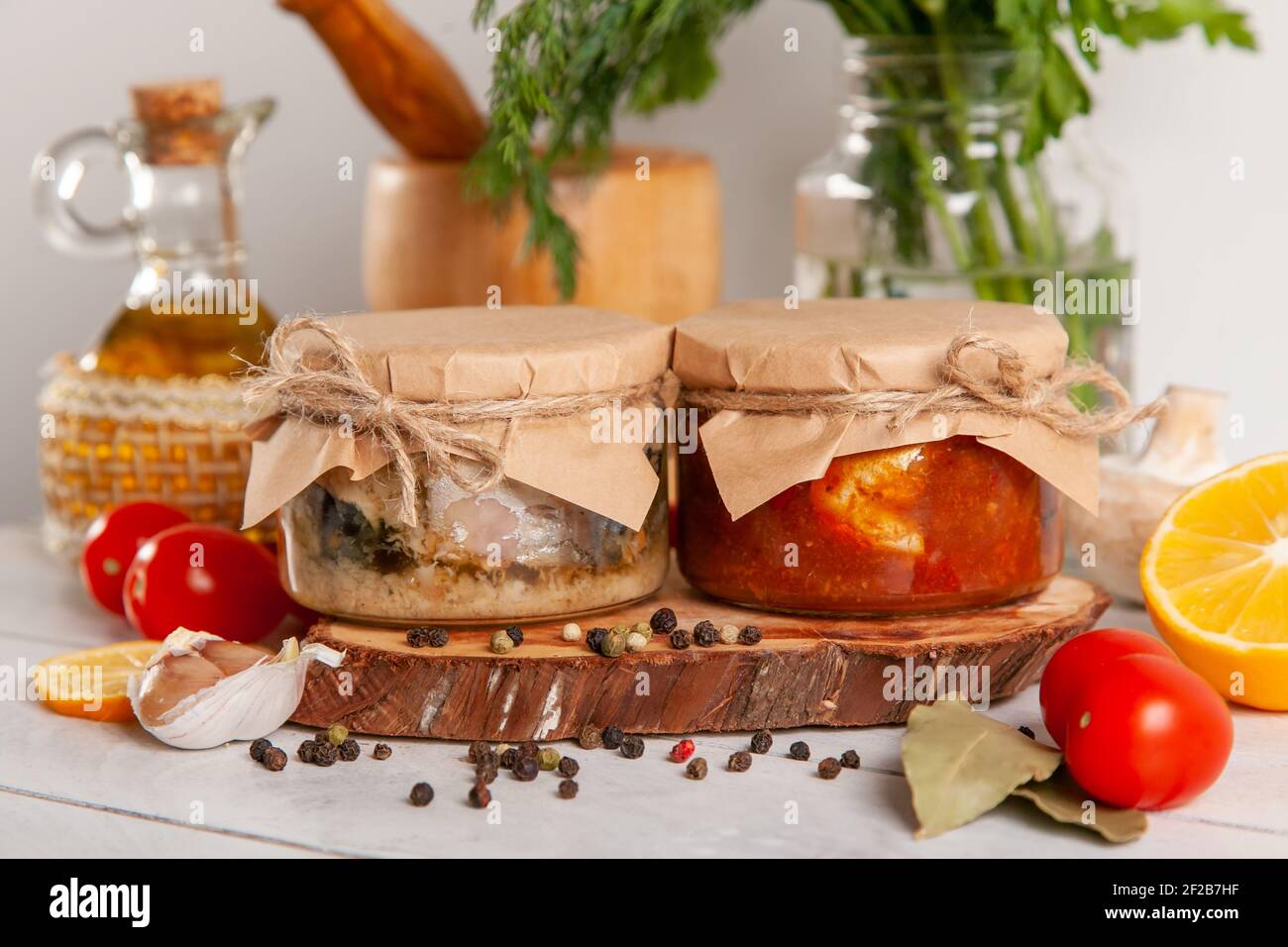 Homemade canned fish from mackerel in oil and tomato paste. Glass jars ...
