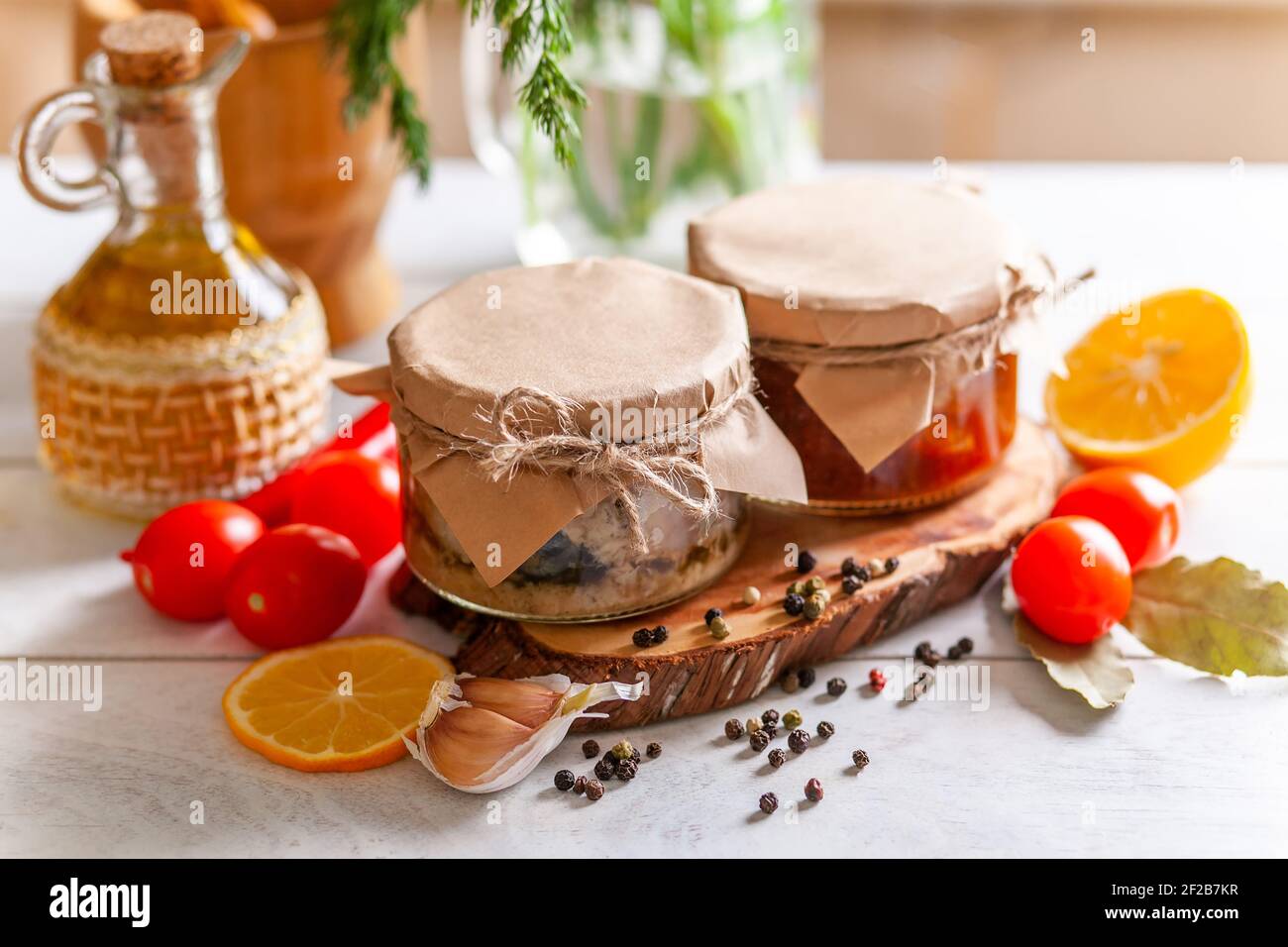 Homemade canned fish from mackerel in oil and tomato paste. Glass jars ...