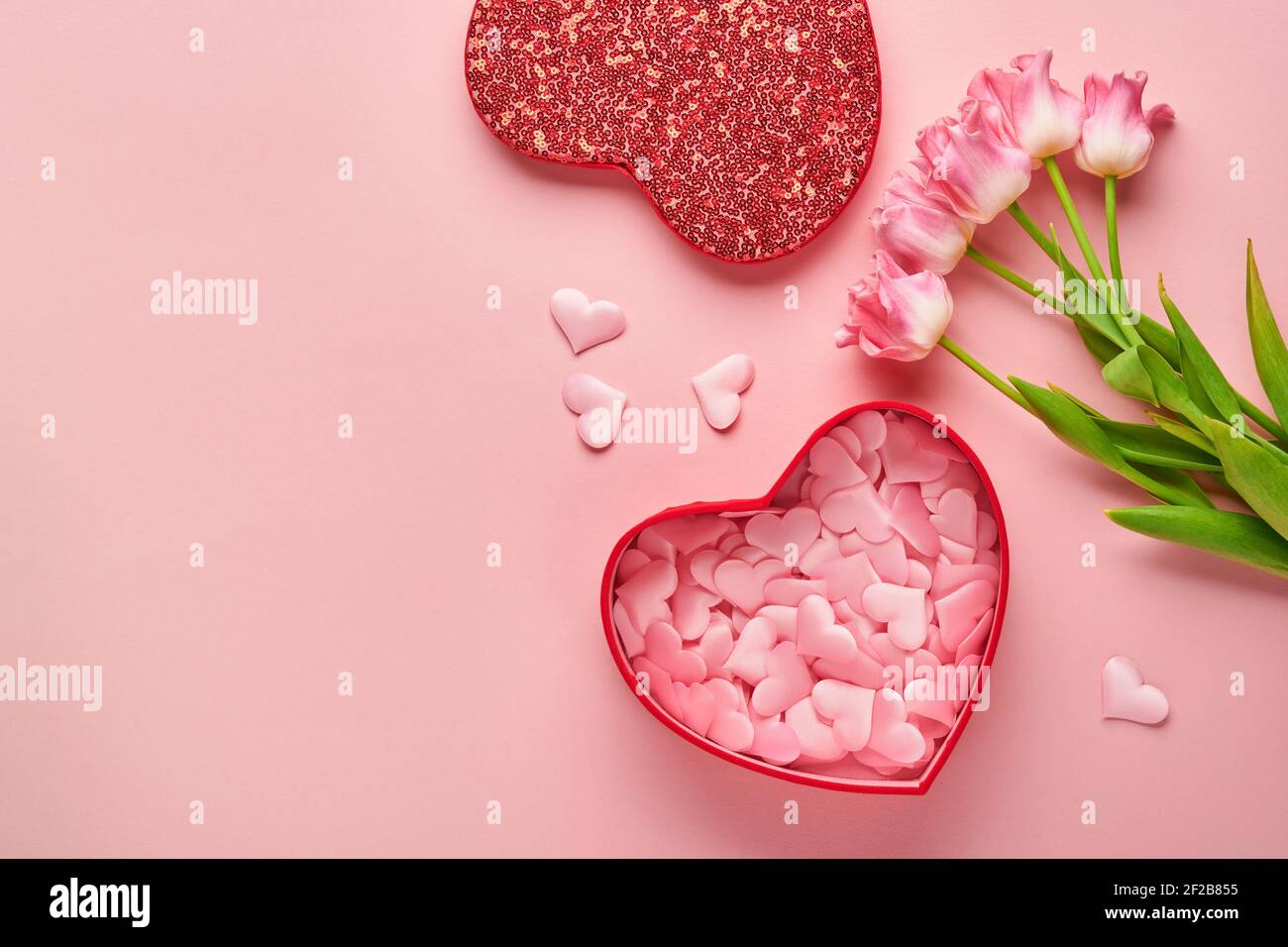 Festive composition with beautiful delicate tulips flowers in pink ...