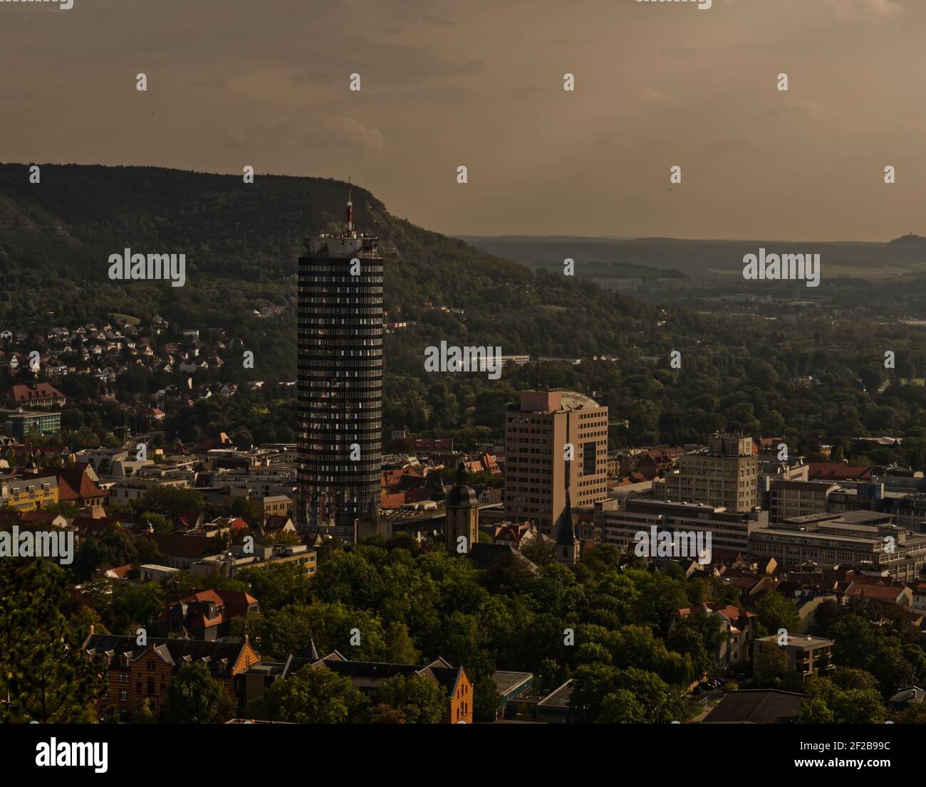 The buildings and mountains of Jena with a cloudy sky Stock Photo - Alamy