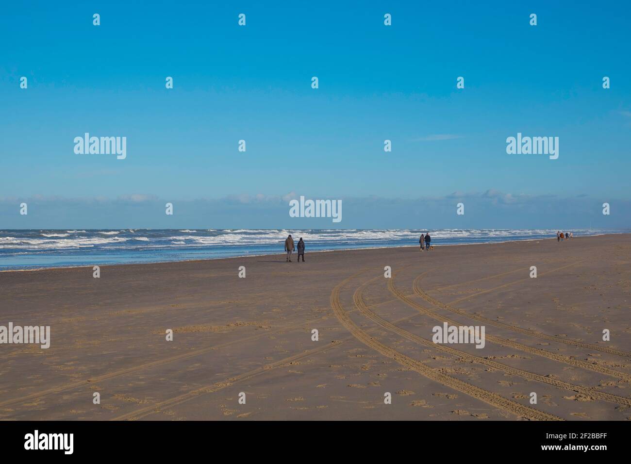 people walking at the beach Stock Photo - Alamy