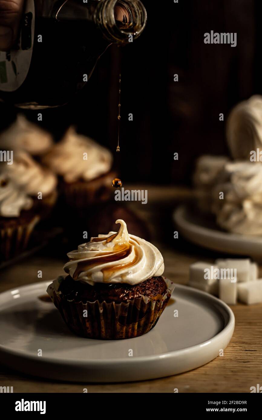 Cupcake on a dessert table background Stock Photo - Alamy