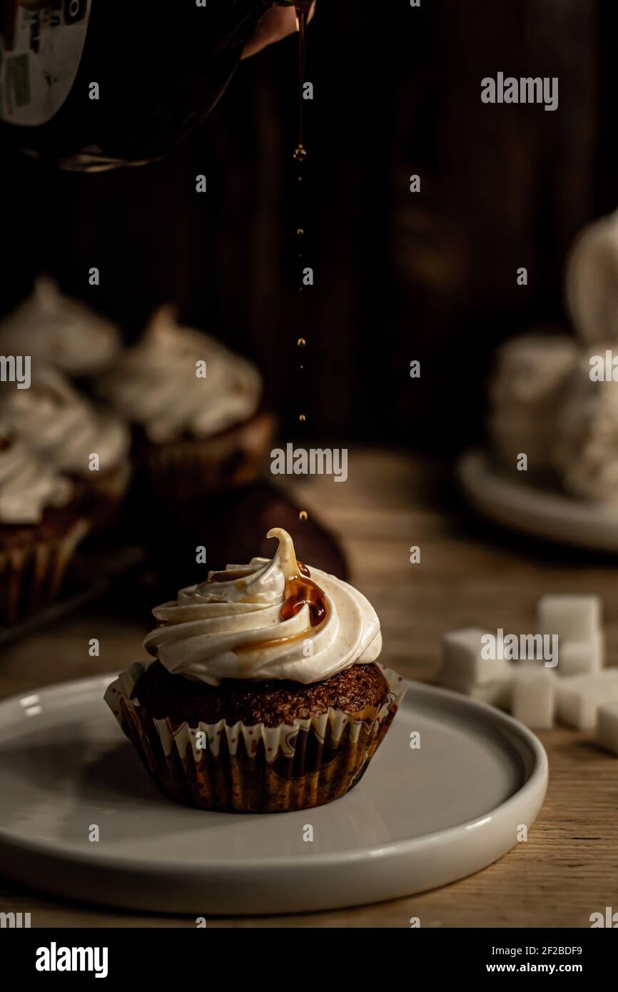 Cupcake on a dessert table background Stock Photo - Alamy