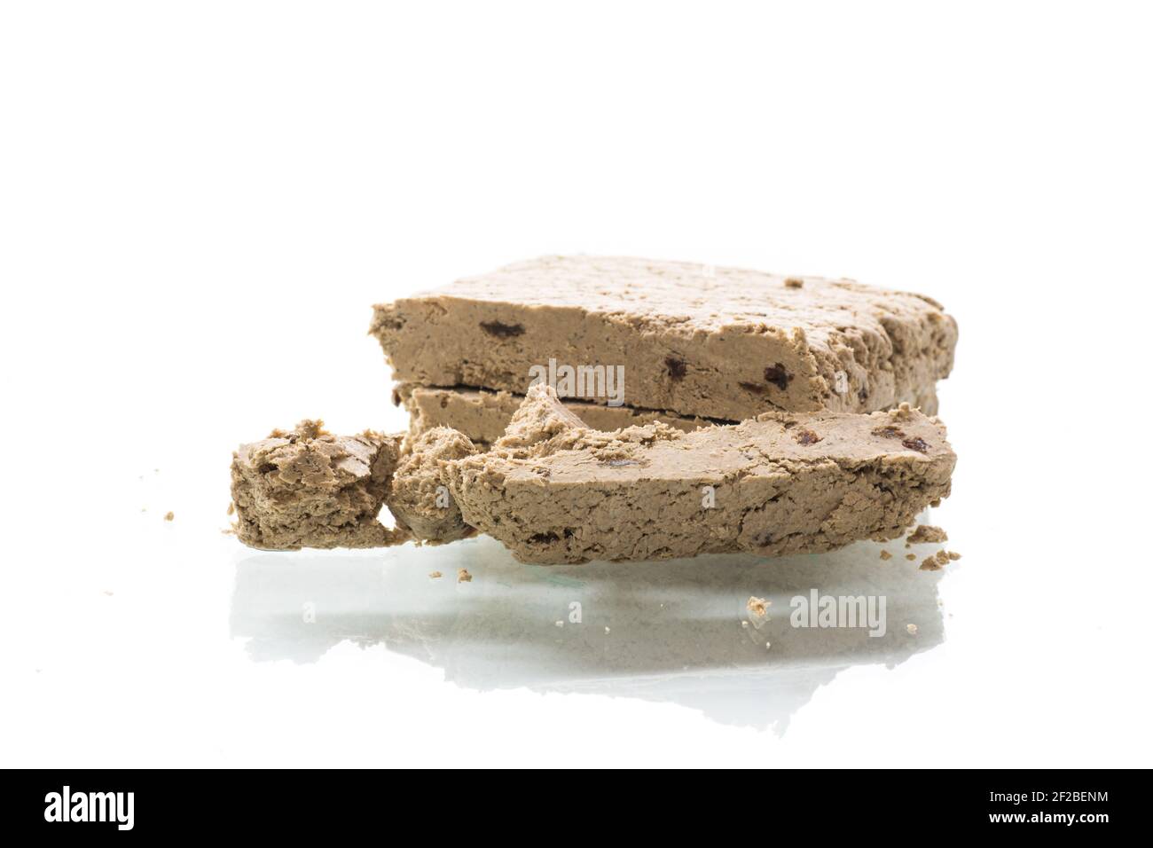 piece of sweet halva isolated on white background Stock Photo - Alamy