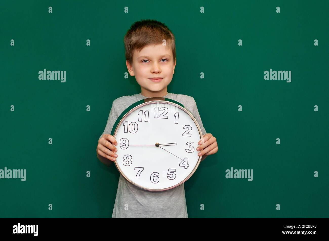Little boy clock hi-res stock photography and images - Alamy