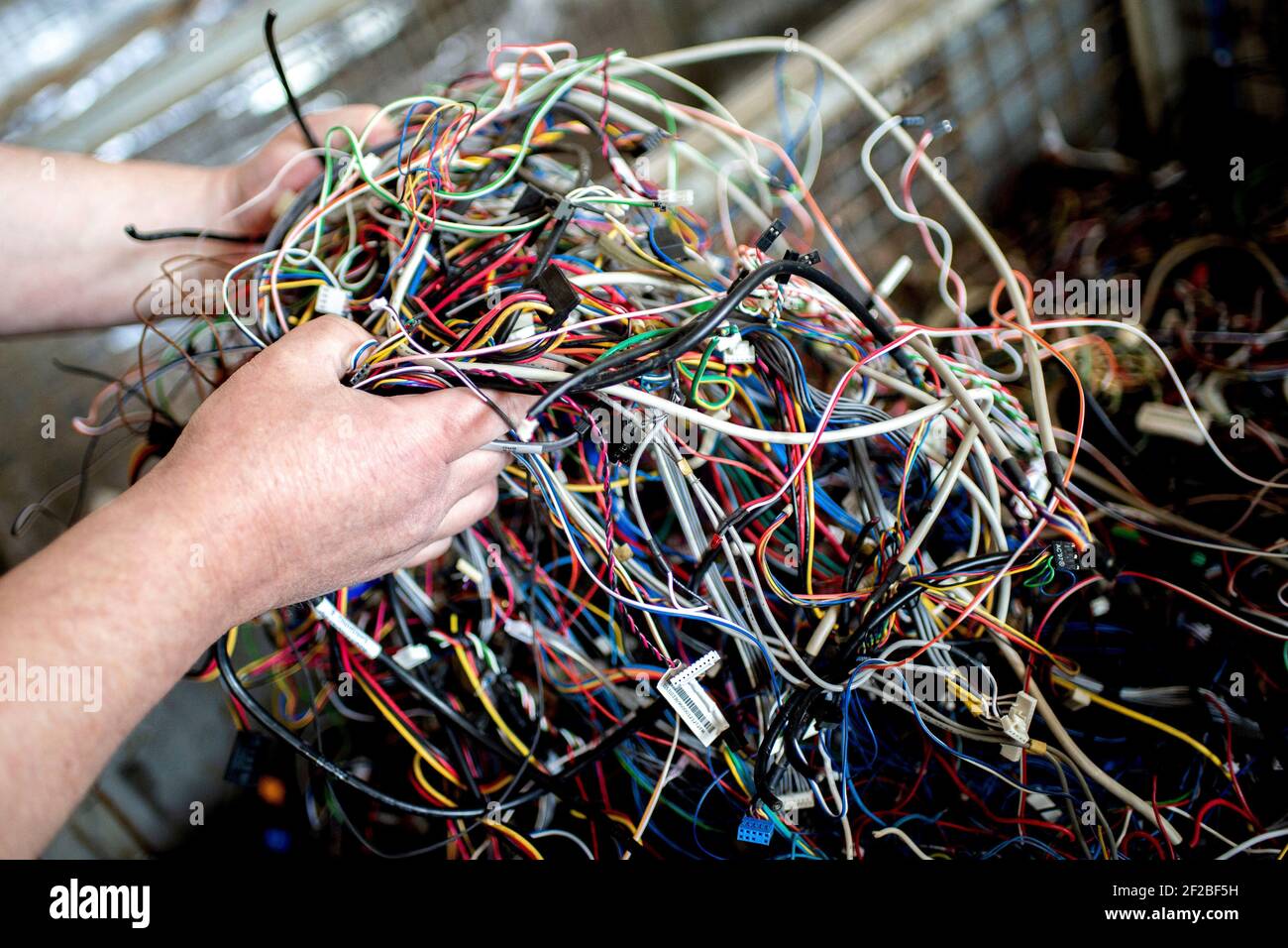 Throwing away old electronic scrap hi-res stock photography and images ...