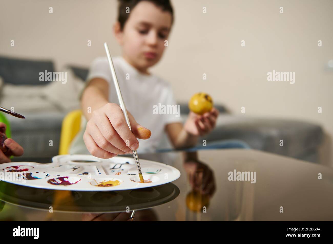 Child picking at paint hi-res stock photography and images - Alamy