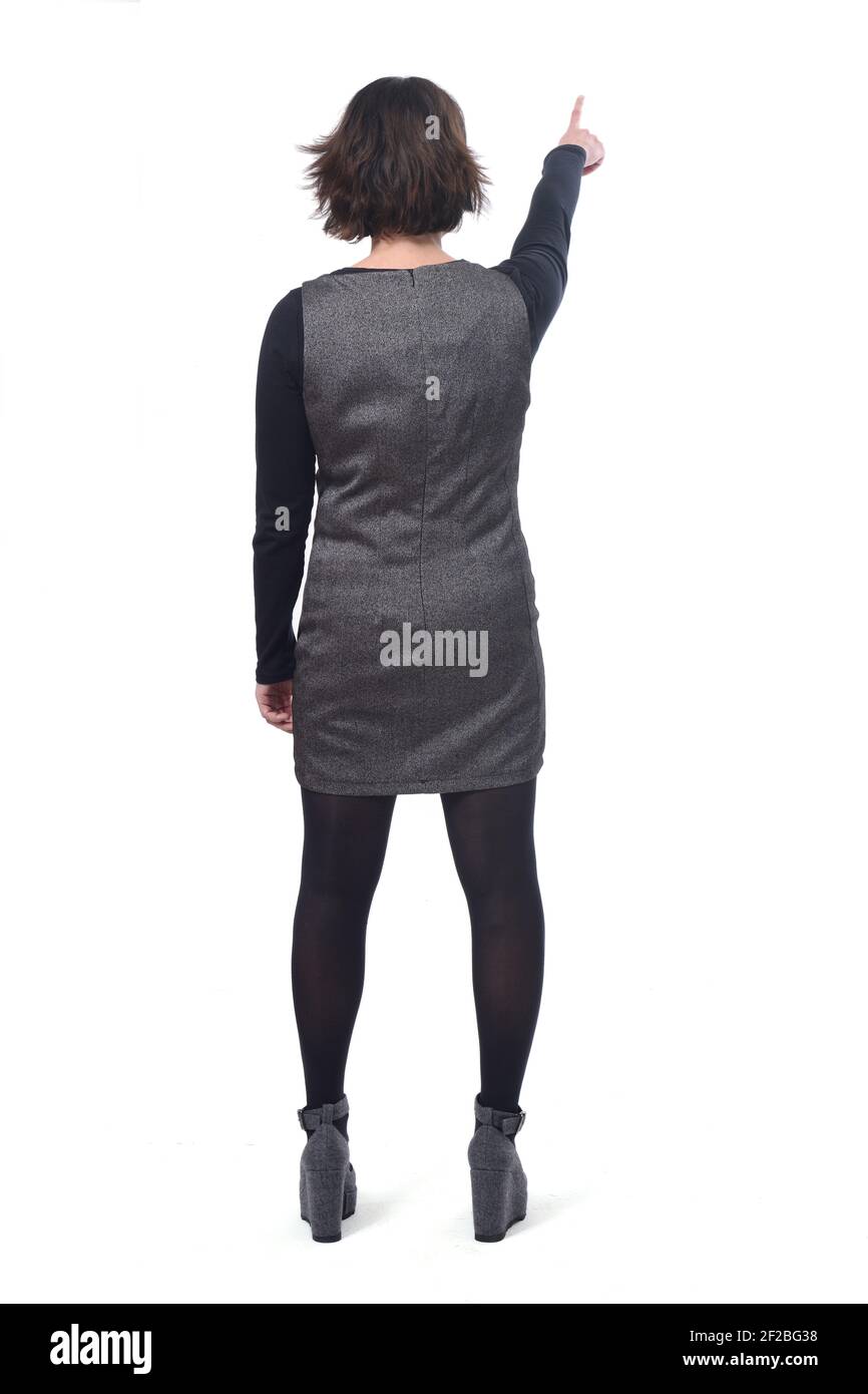 Portrait brunette woman pointing behind hi-res stock photography and ...