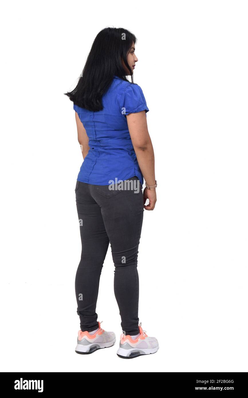 Full portrait of a woman from behind with looking on white background ...
