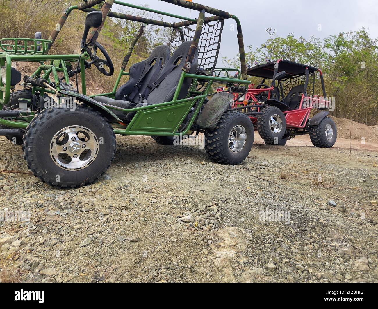The red and green buggy cars Stock Photo - Alamy