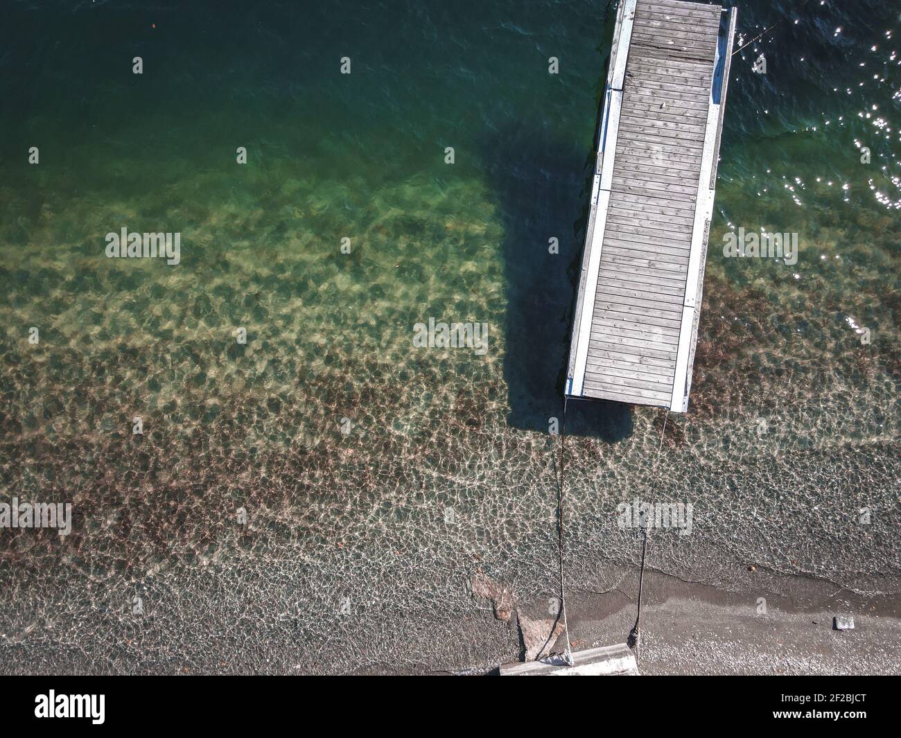 A high angle shot of a dock by the sea Stock Photo - Alamy