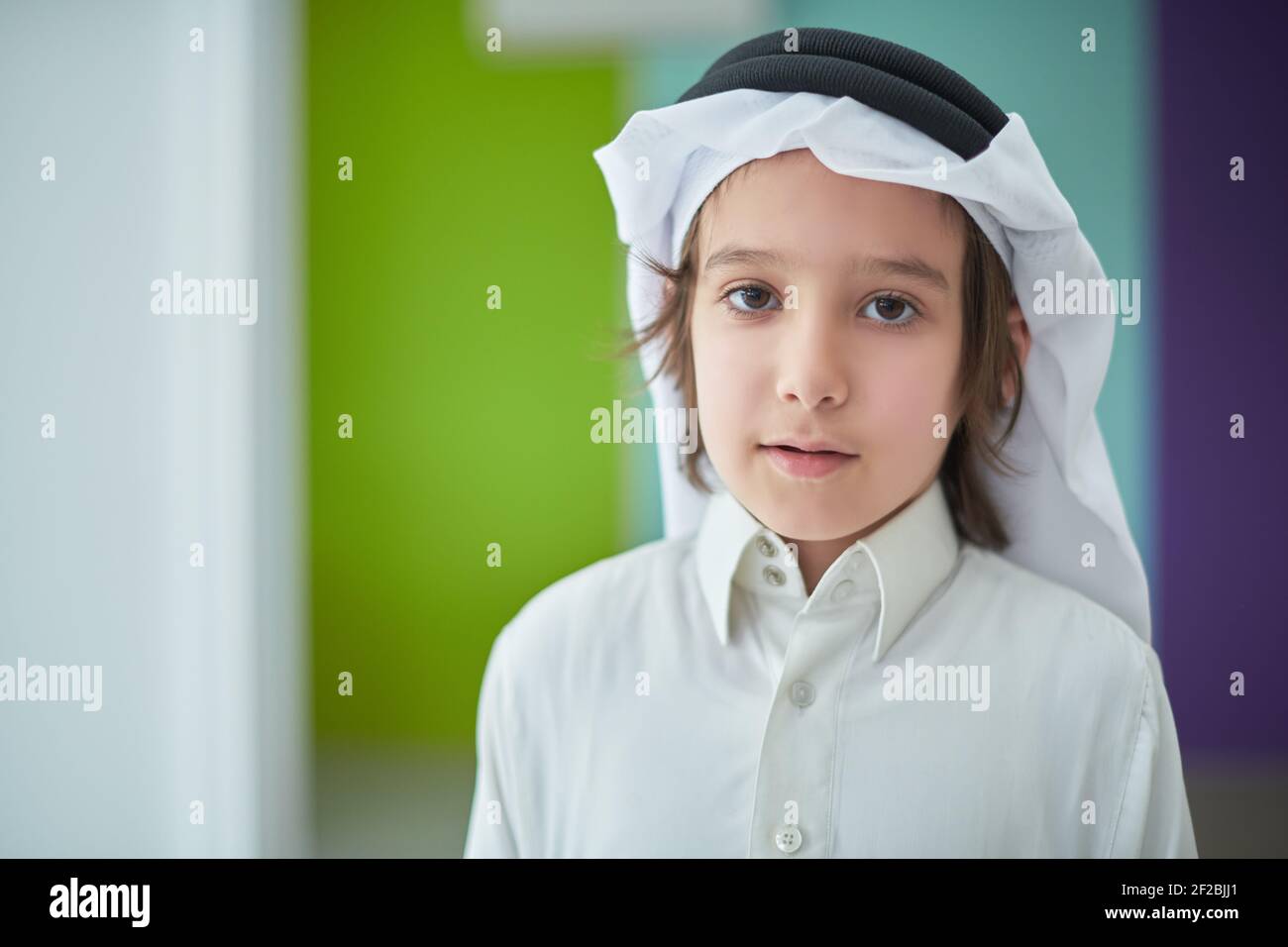 Portrait of Arabian boy in traditional clothes Stock Photo - Alamy