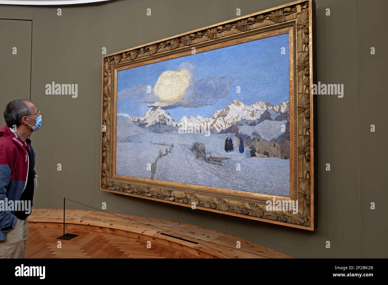 interior of the Segantini Museum, with visitors wearing safety mask ...