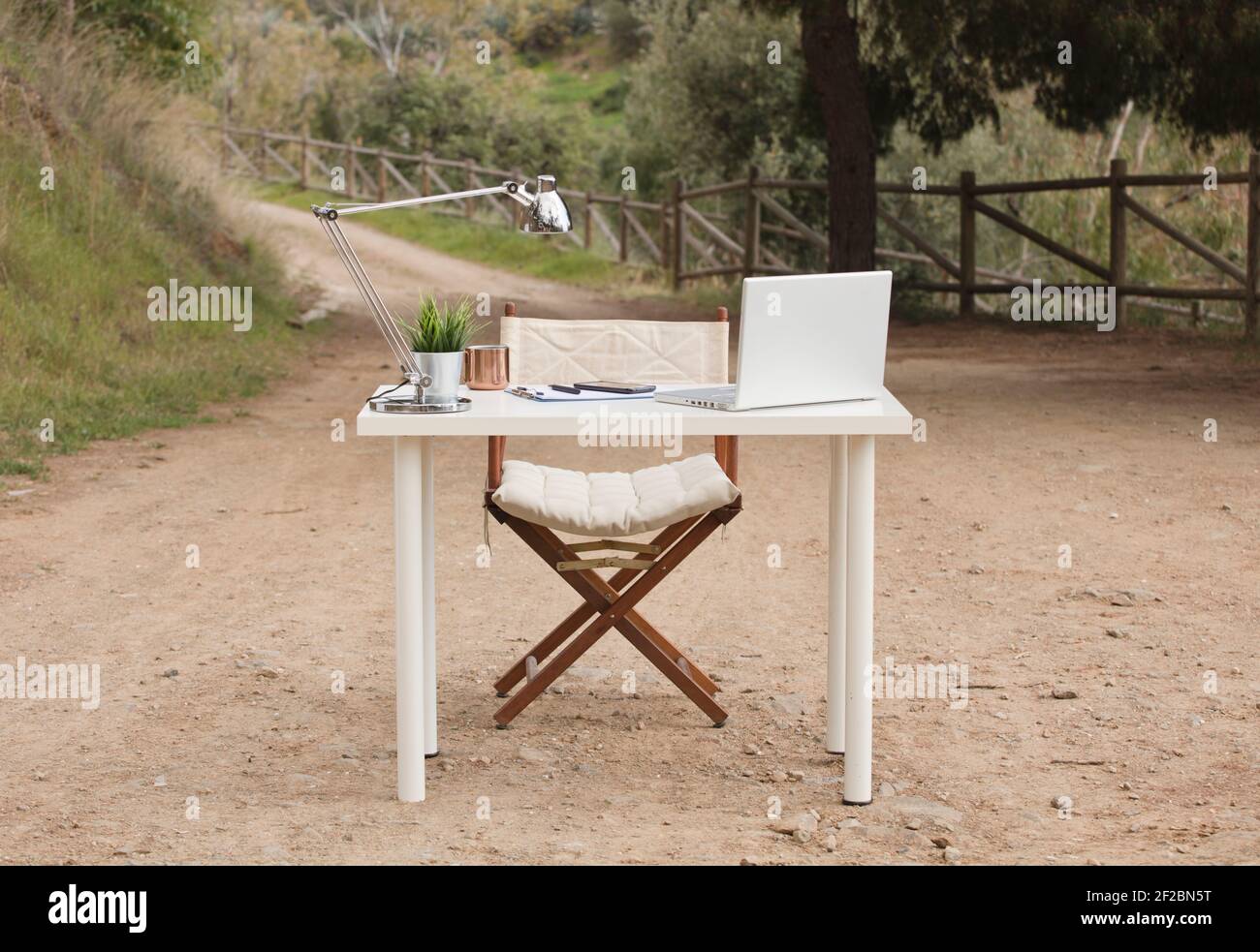 digital nomad work table in the field Stock Photo - Alamy